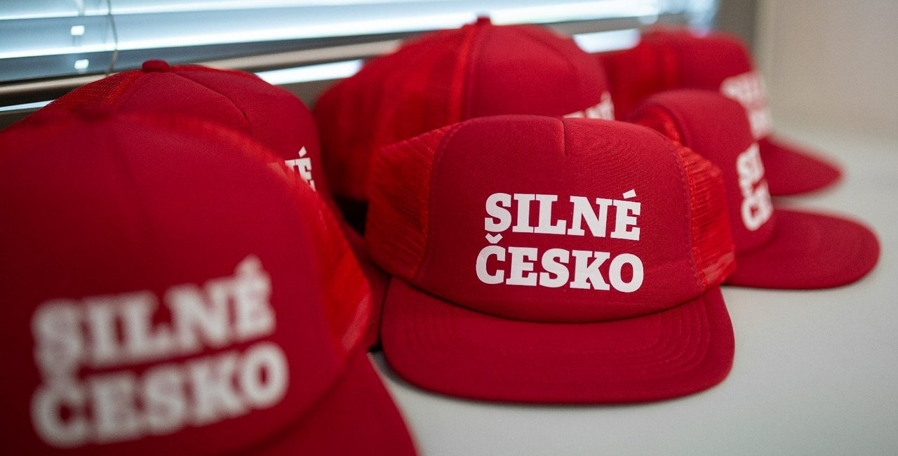 Czech Prime Minister Andrej Babiš unveils Trump-inspired baseball caps ...
